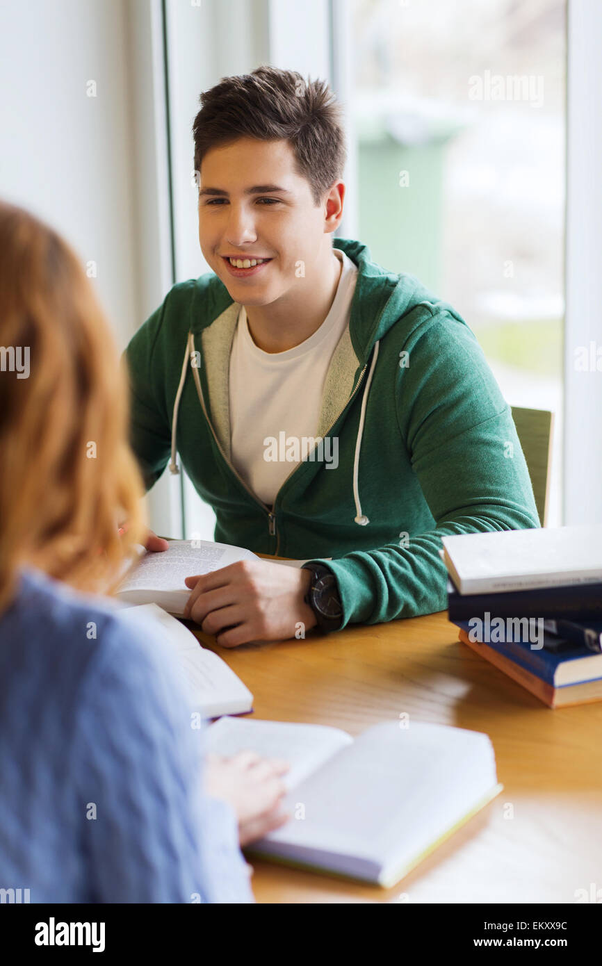 students with books preparing to exam in library Stock Photo - Alamy