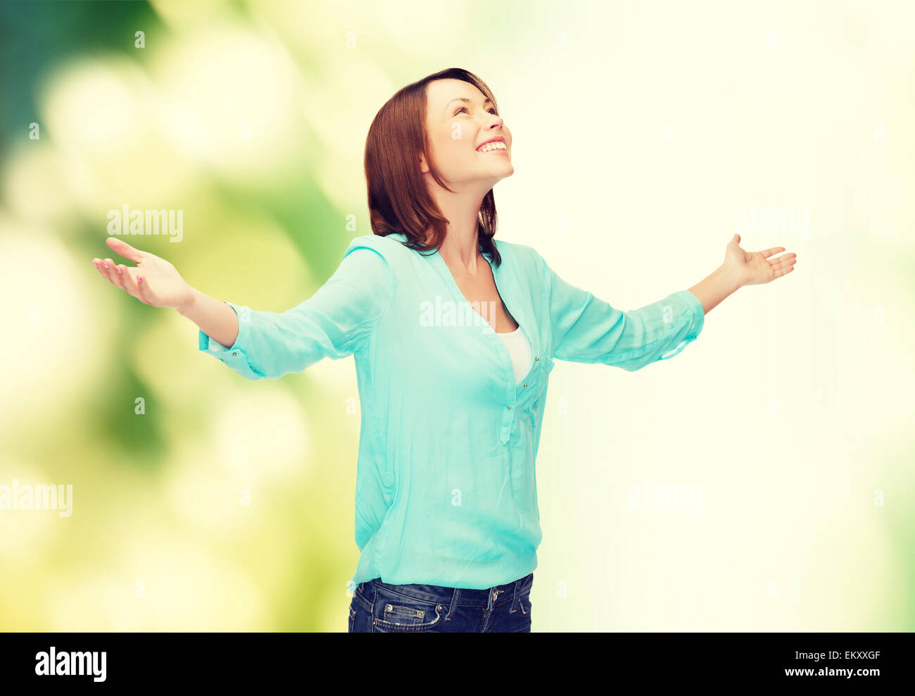 smiling woman waving hands Stock Photo - Alamy