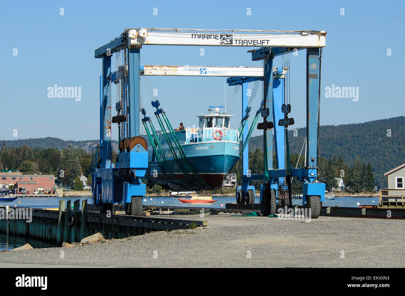 The 'Sebago' ferry is lifted out of the water for winter storage ...