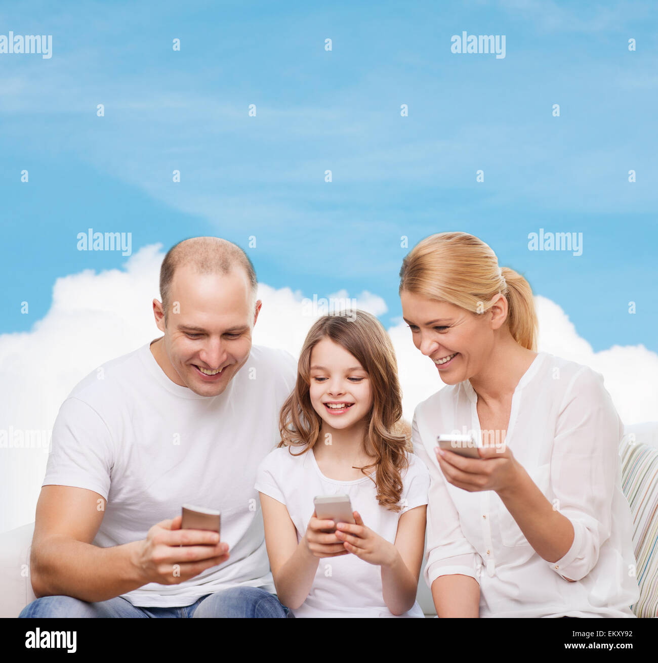 happy family with smartphones Stock Photo - Alamy