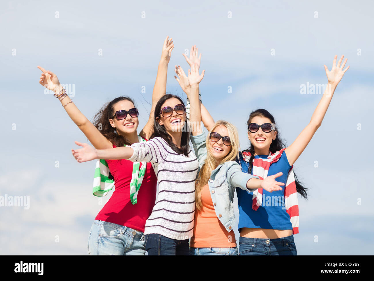 beautiful teenage girls or young women having fun Stock Photo - Alamy