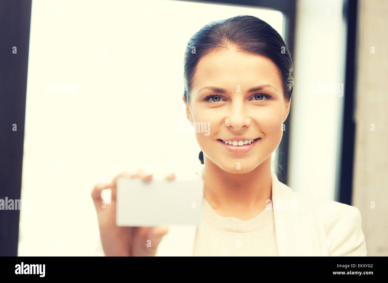 woman with business card Stock Photo - Alamy
