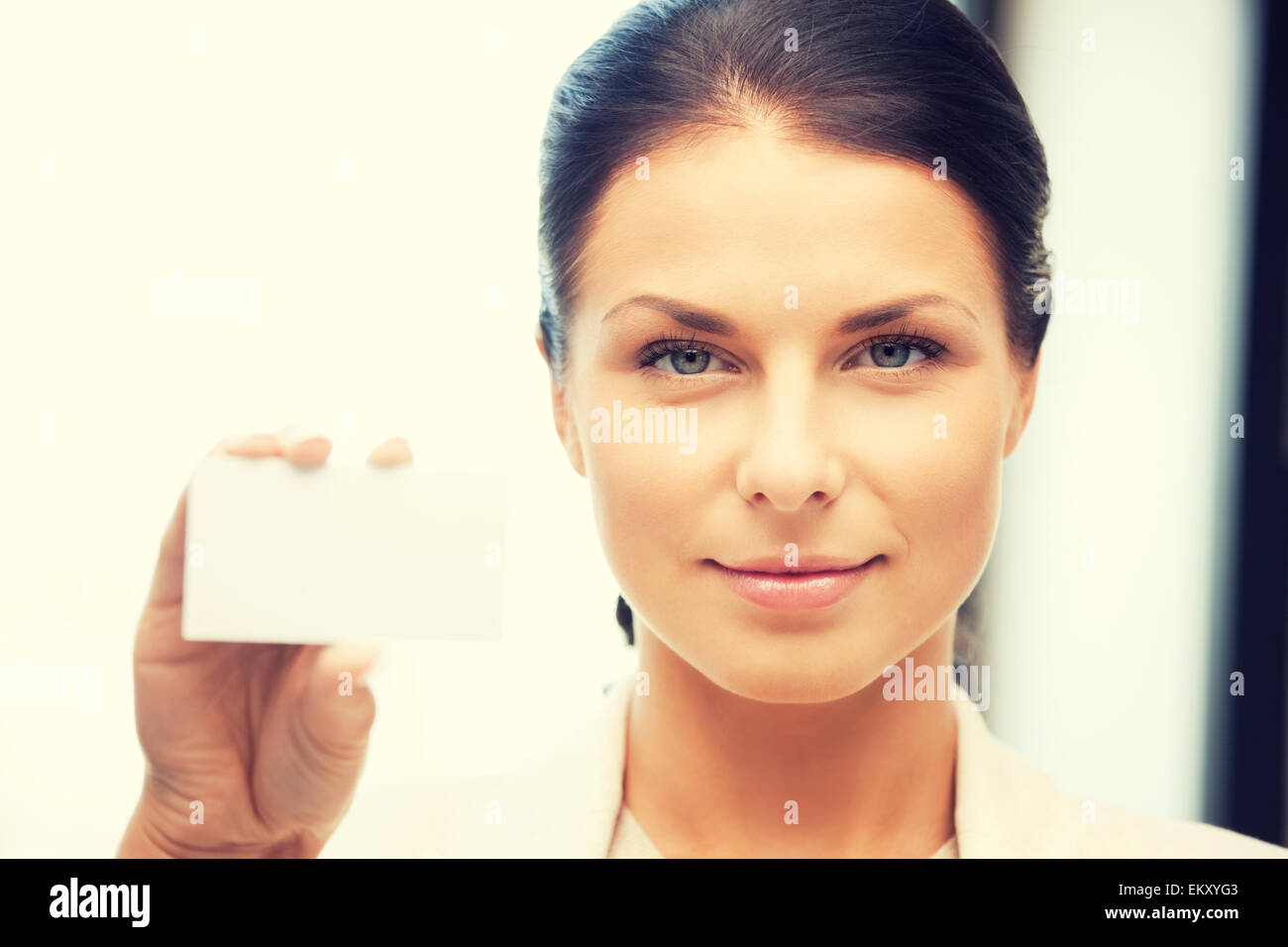 woman with business card Stock Photo - Alamy