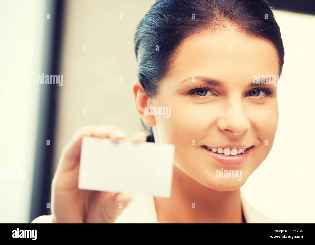 woman with business card Stock Photo - Alamy