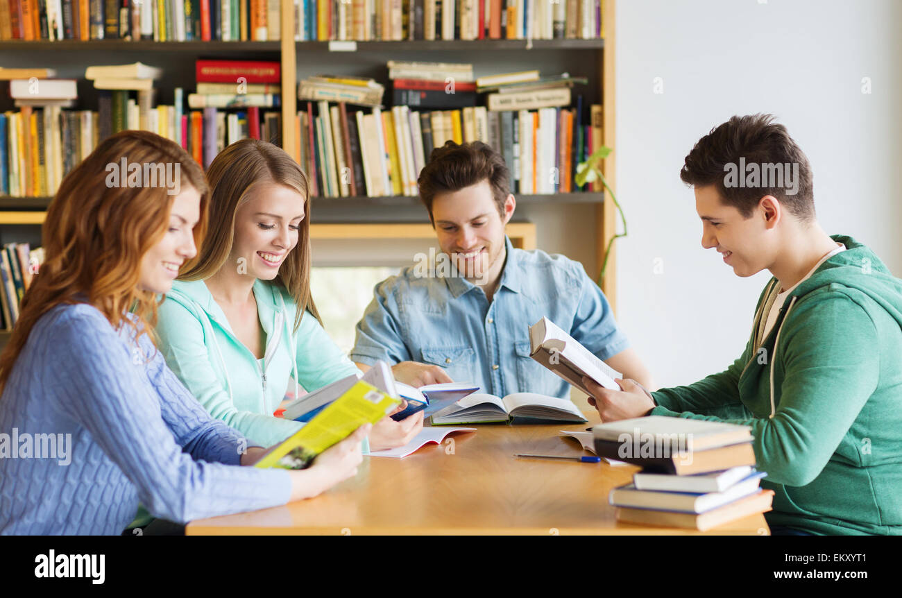 students with books preparing to exam in library Stock Photo - Alamy