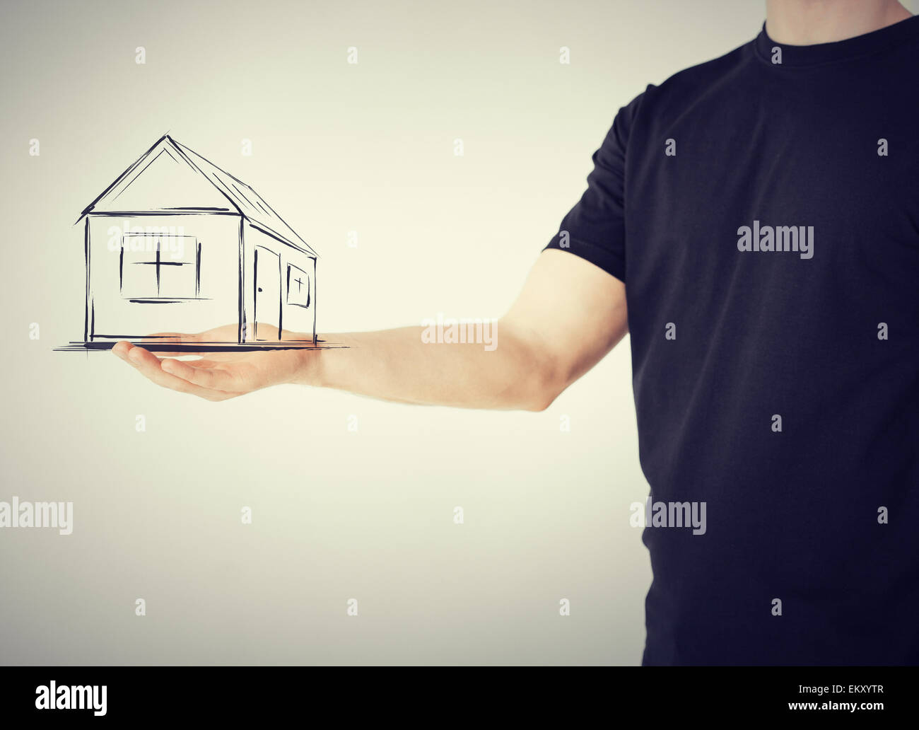 house on virtual screen in man hand Stock Photo - Alamy