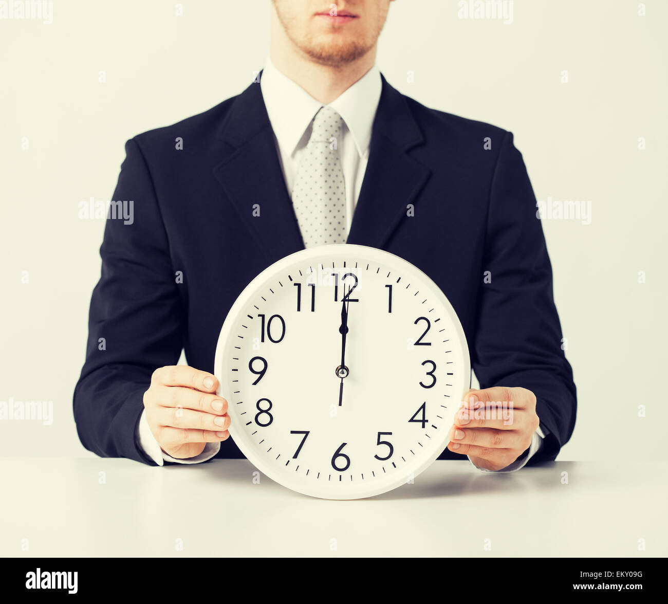 man with wall clock Stock Photo - Alamy