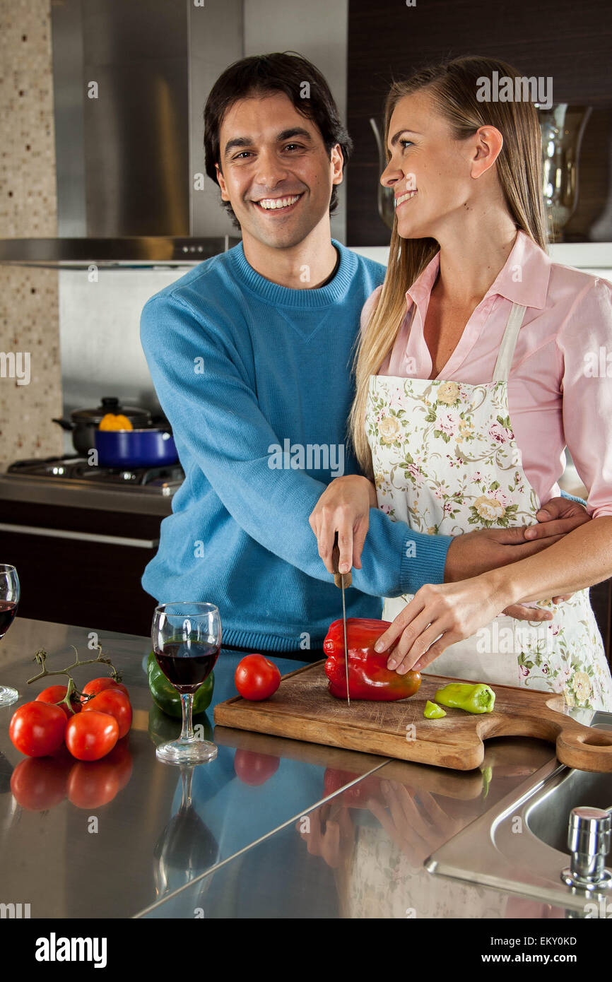 Couple in the kitchen Stock Photo - Alamy