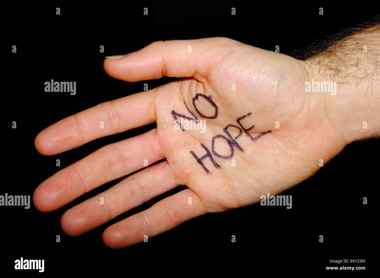 A hand with the words "no hope" written on it in permanent marker Stock ...