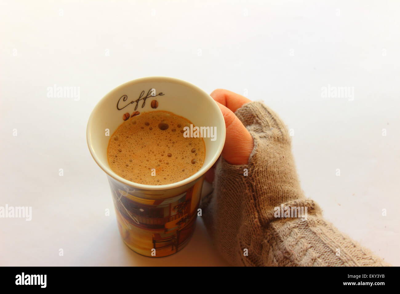 cup of coffee in hand Stock Photo - Alamy