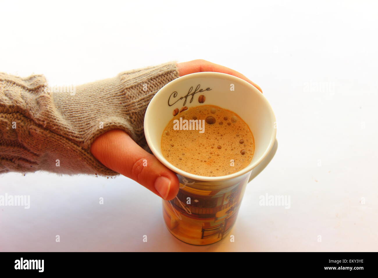 cup of coffee in hand Stock Photo - Alamy