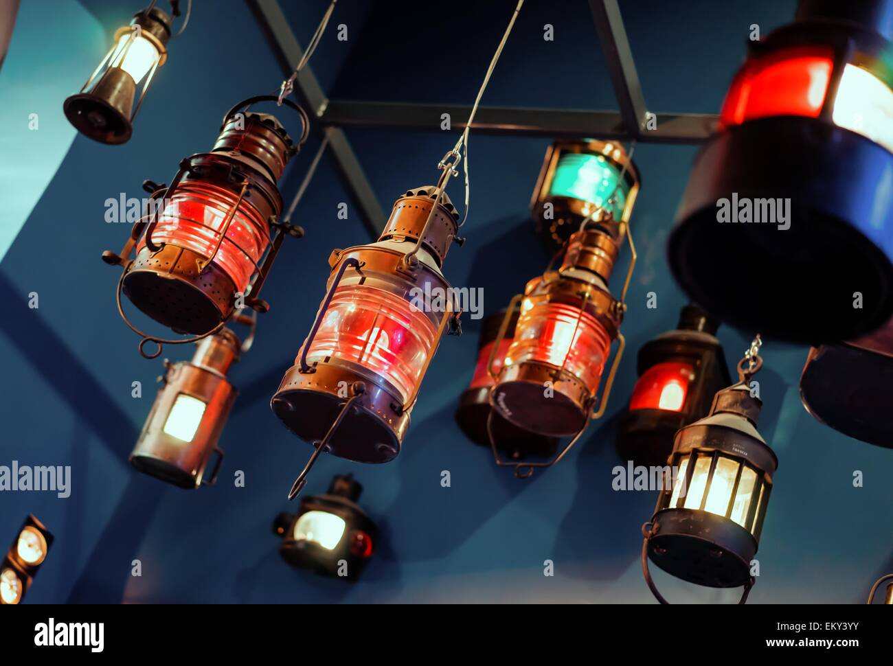 A collection of nautical, historical lanterns hanging Stock Photo - Alamy
