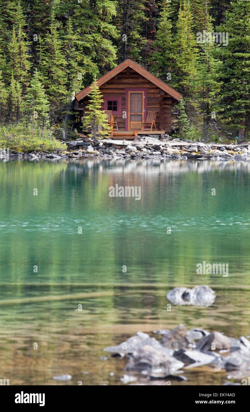 Wooden Cabin Along A Lake Shore Stock Photo - Alamy