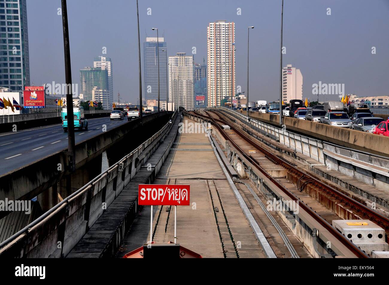 Bangkok, Thailand: BTS Skytrain tracks next and lanes of heavy traffic ...