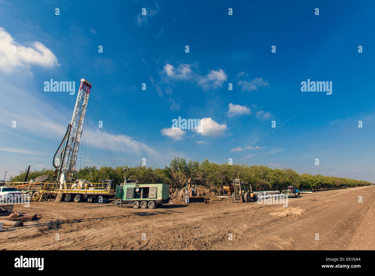 Water well being drilled in Almond orchard. Tulare County, San Joaquin ...