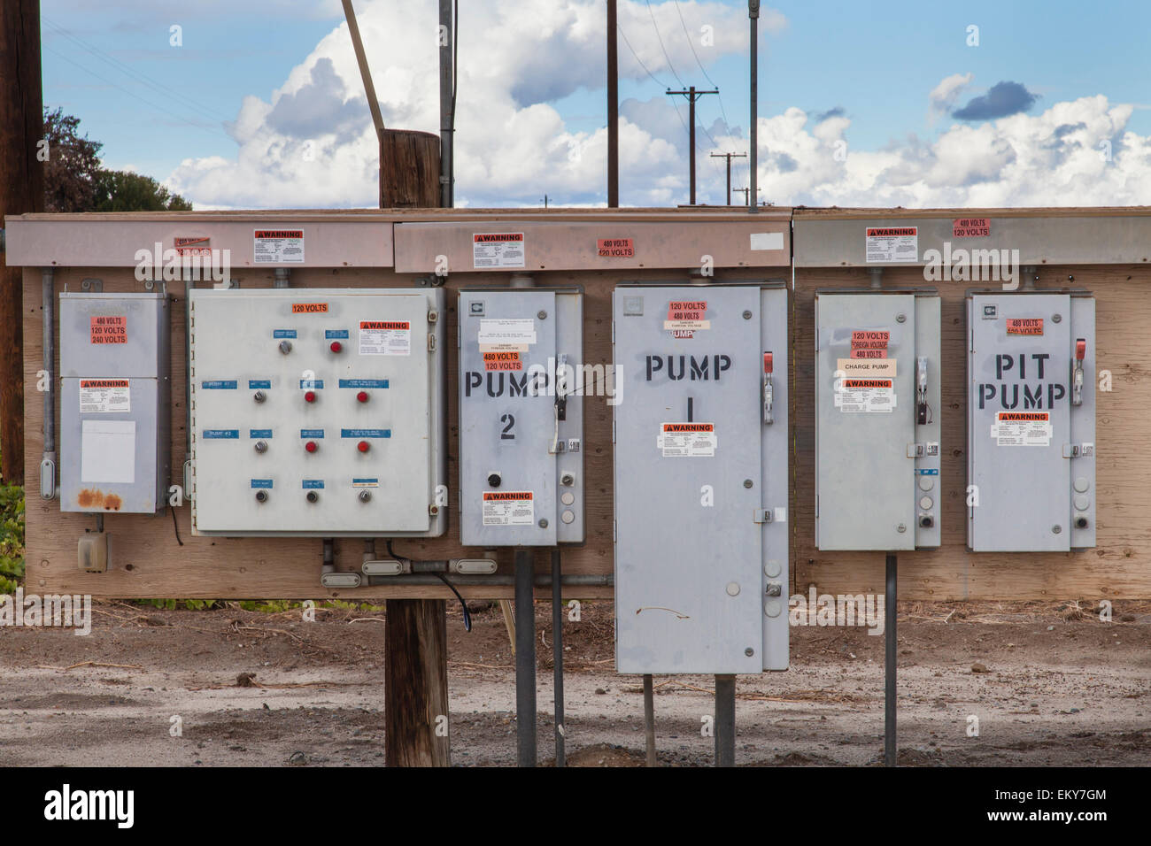 Pump station near deep injection well used for disposal of oil drilling ...