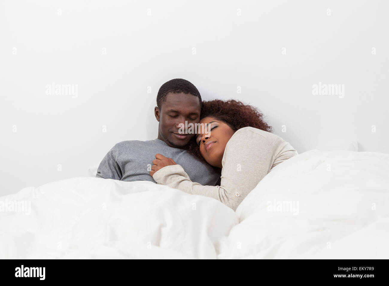 African couple in love on the bed Stock Photo - Alamy