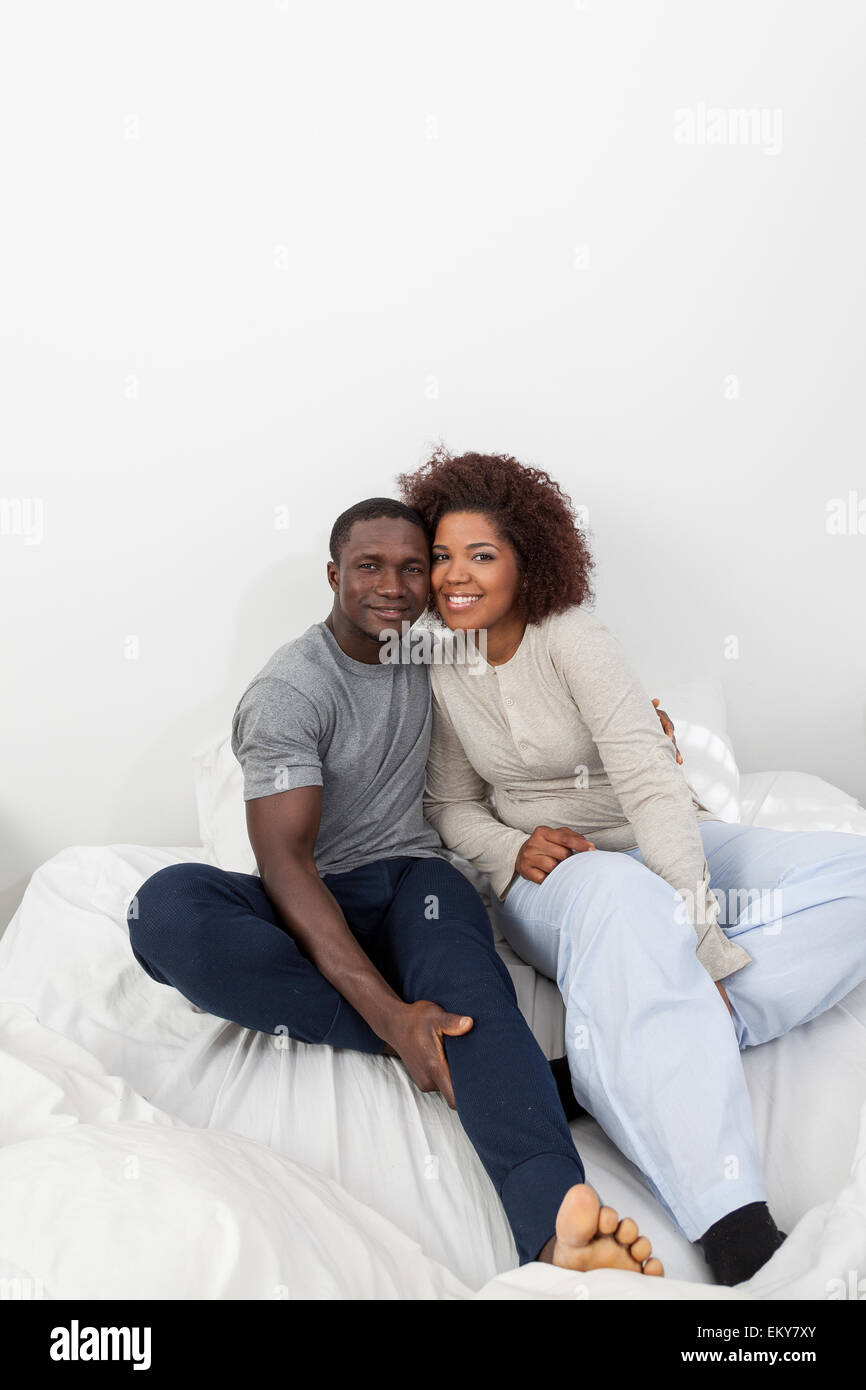 African couple in love on the bed Stock Photo - Alamy