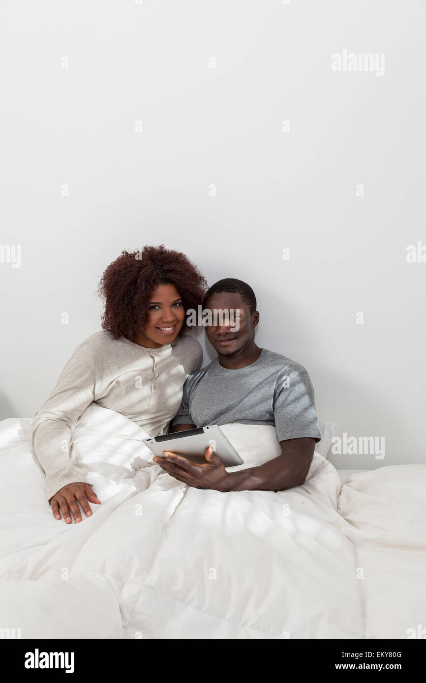 African couple in love on the bed Stock Photo - Alamy