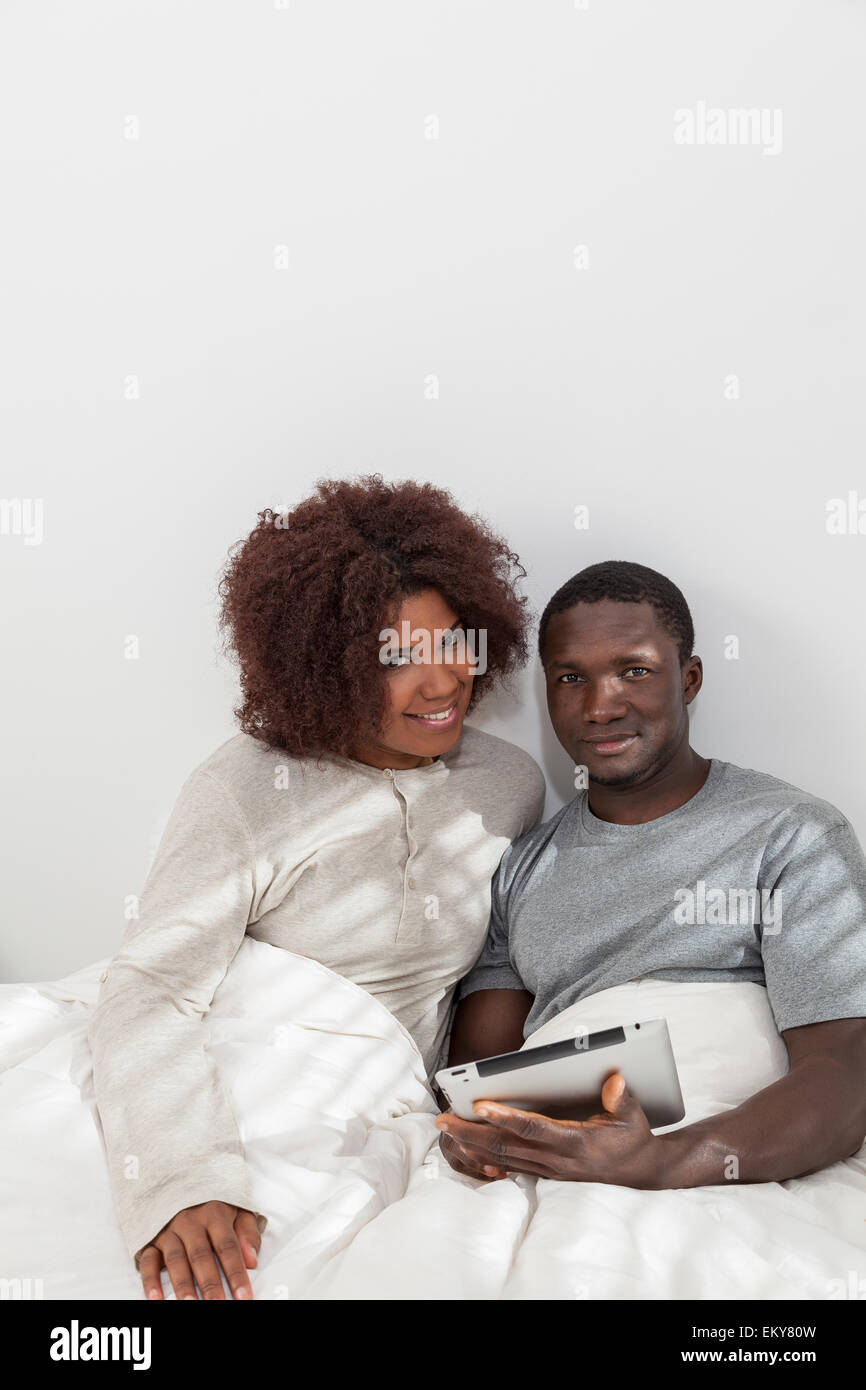 African couple in love on the bed Stock Photo - Alamy