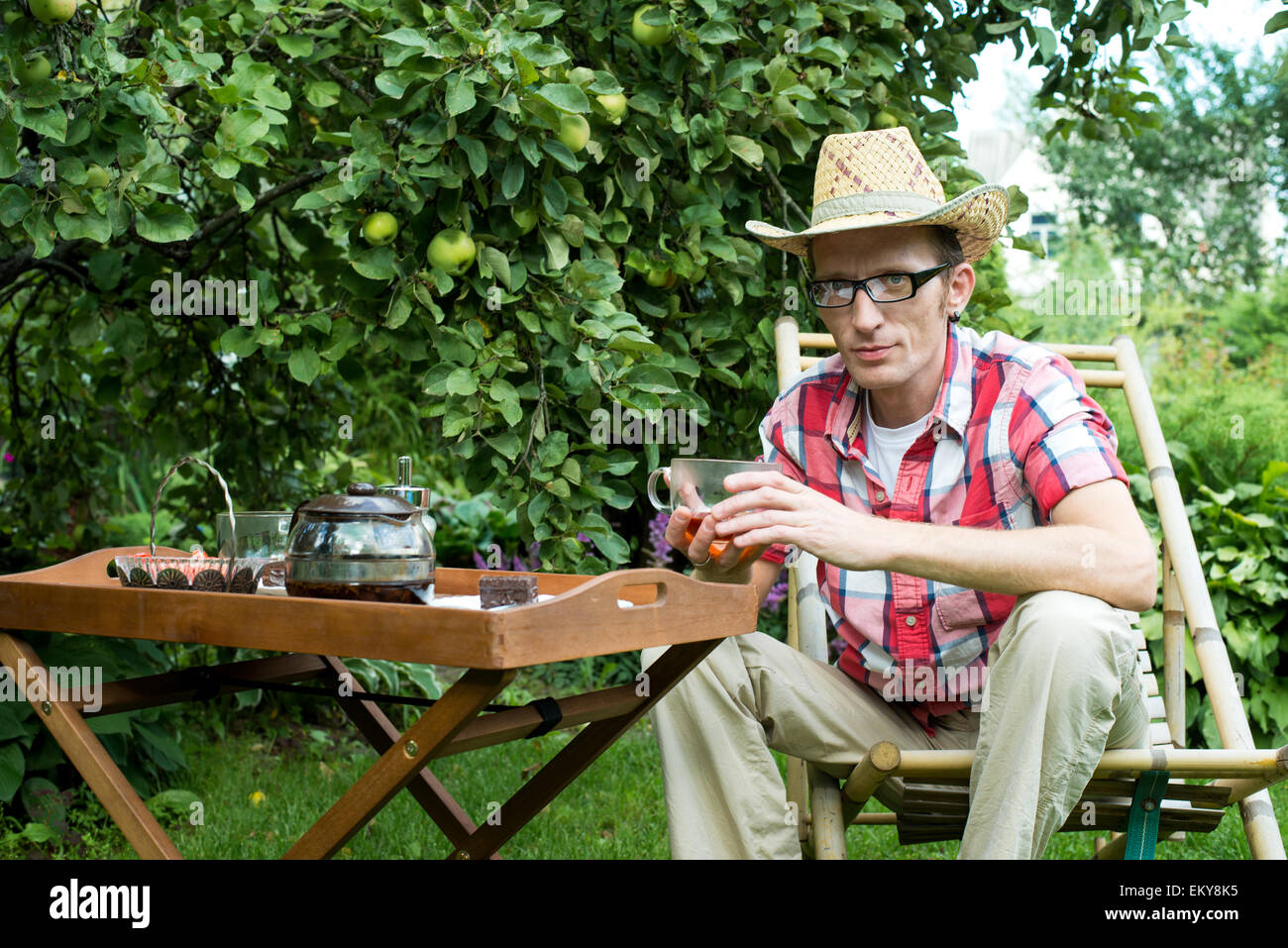 Man drinking tea Stock Photo - Alamy