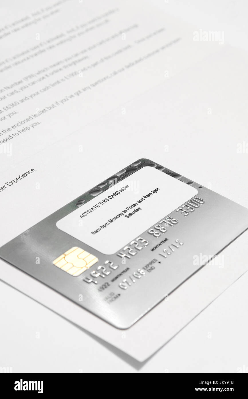 new bank credit card card still stuck on the bank letter ready to be ...