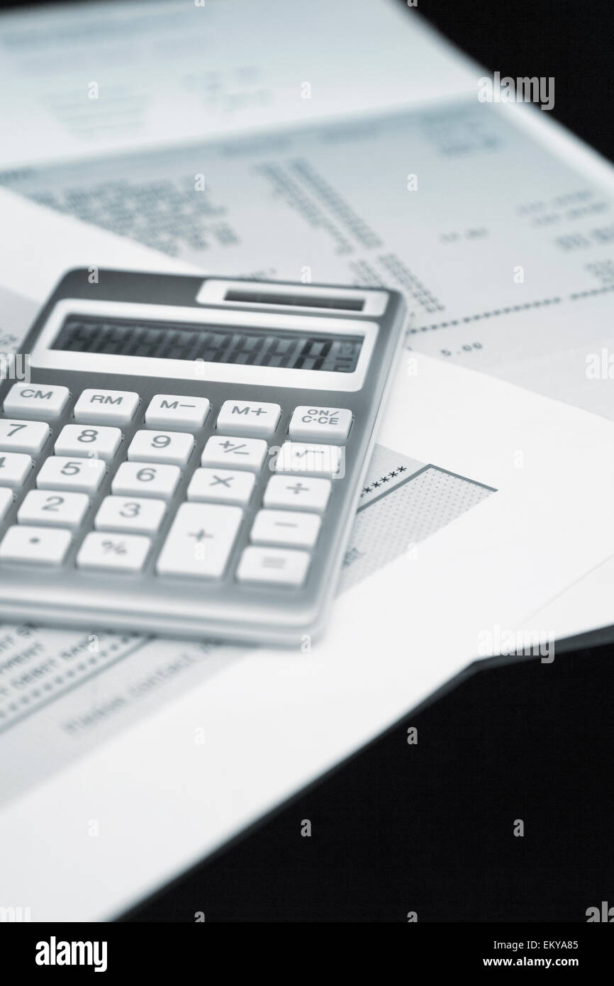 Close up of a calculator on a bank statement Stock Photo - Alamy