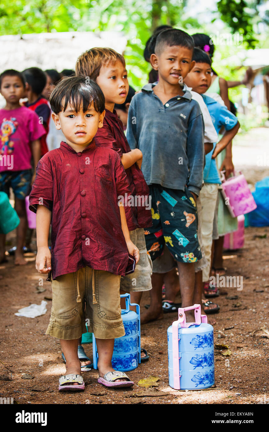 Cambodia, Children waiting in line; Son Touch Stock Photo - Alamy