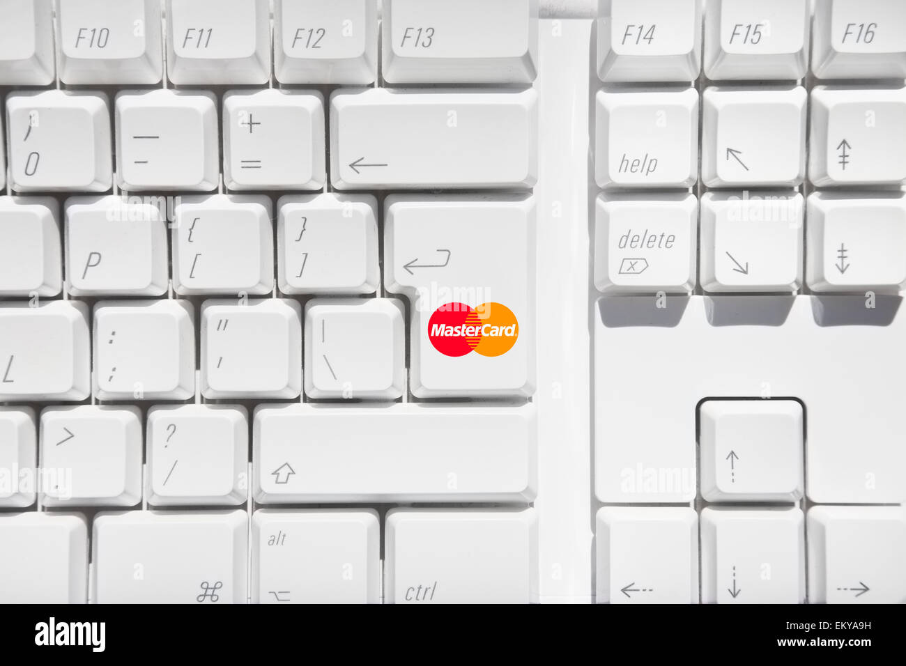 white computer keyboard with a master card logo on the return key Stock ...