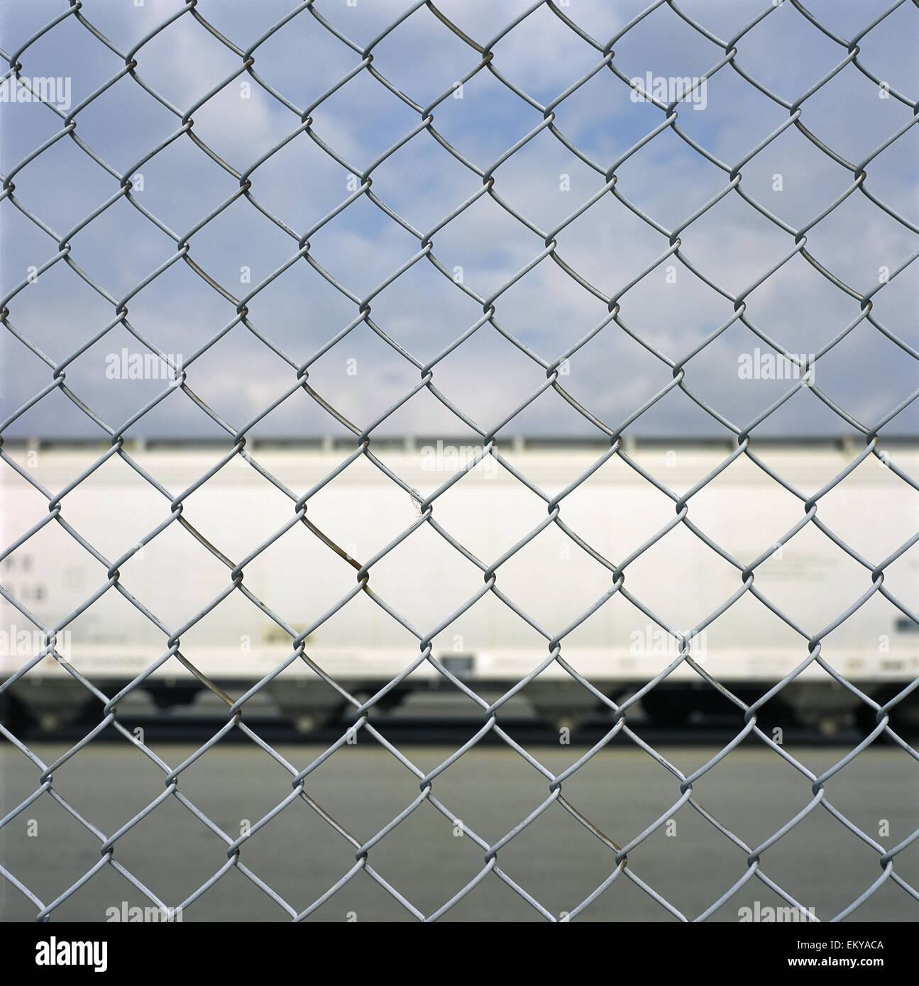 Train behind fence hi-res stock photography and images - Alamy