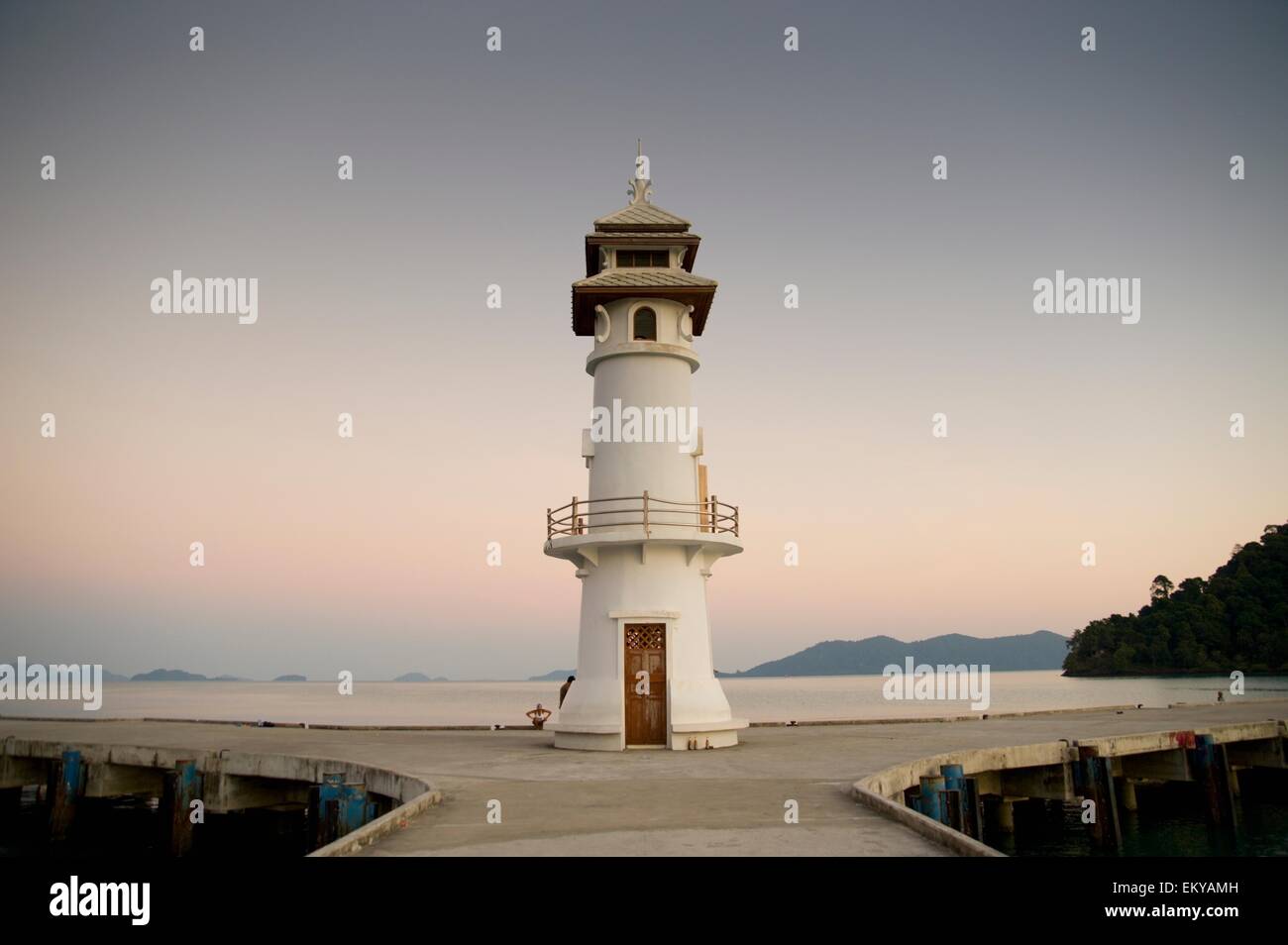A Pier Leading To A Lighthouse; Bang Bao, Koh Chang, Thailand Stock ...