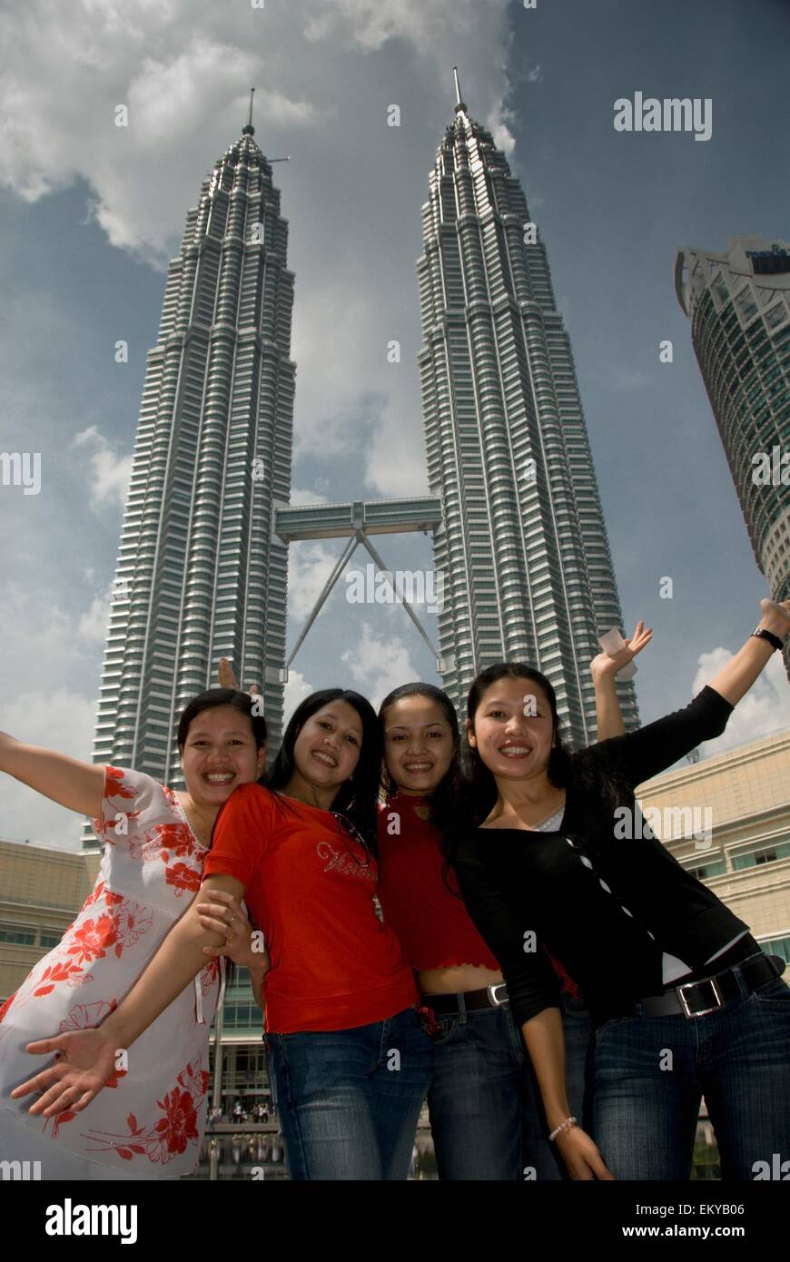 Kuala Lumpur, Malaysia; Four Young Women Posing In Front Of The ...