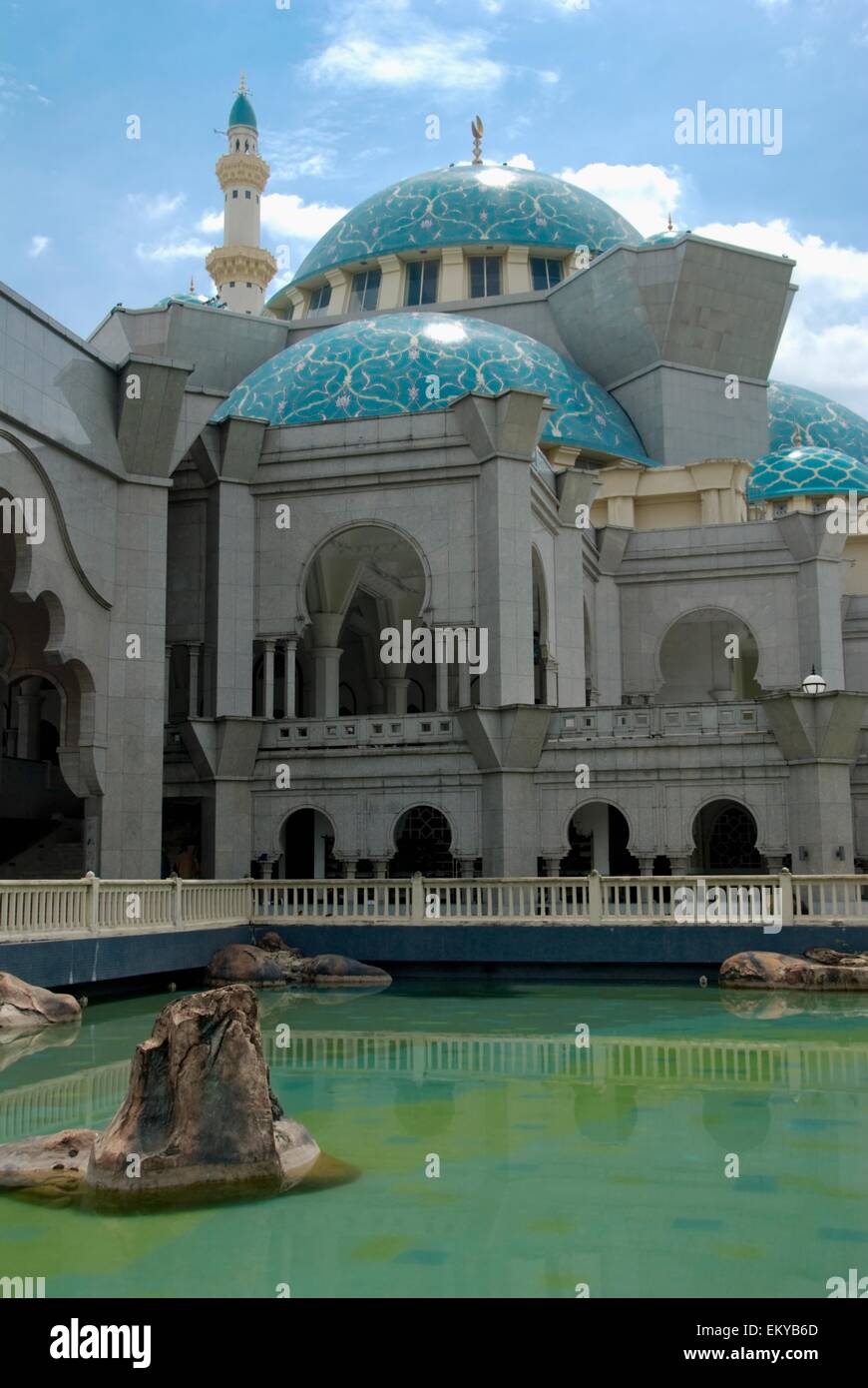 A Building With Blue Domes And Towers On The Roof And Is Surrounded By ...