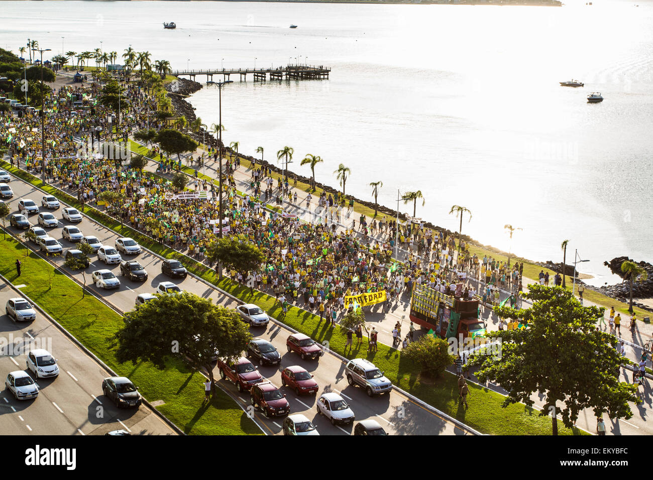 Protesters walk on Beira Mar Norte Avenue in the manifestation for the ...