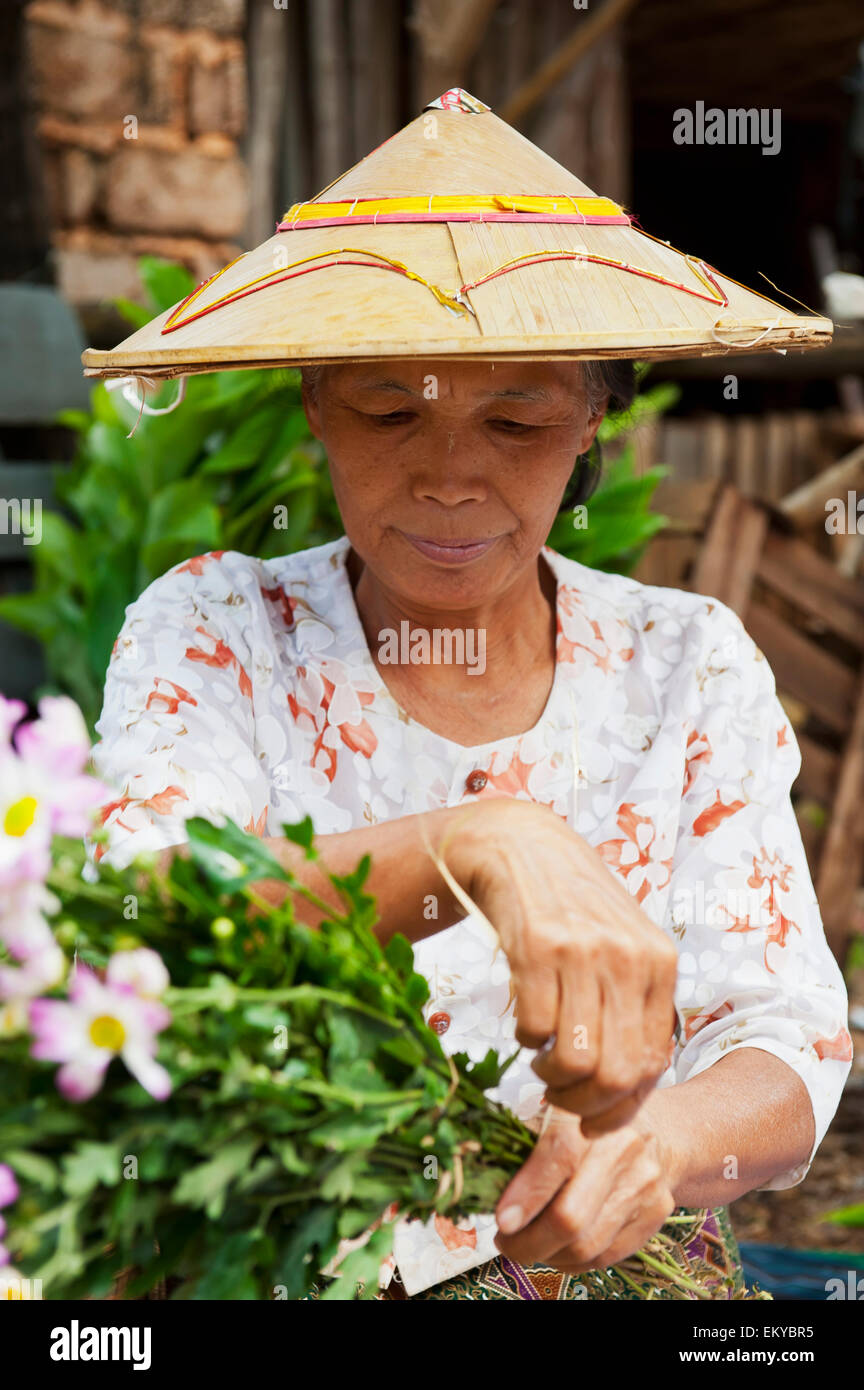 Burma, Lady selling flowers at a market; Shan State Stock Photo - Alamy