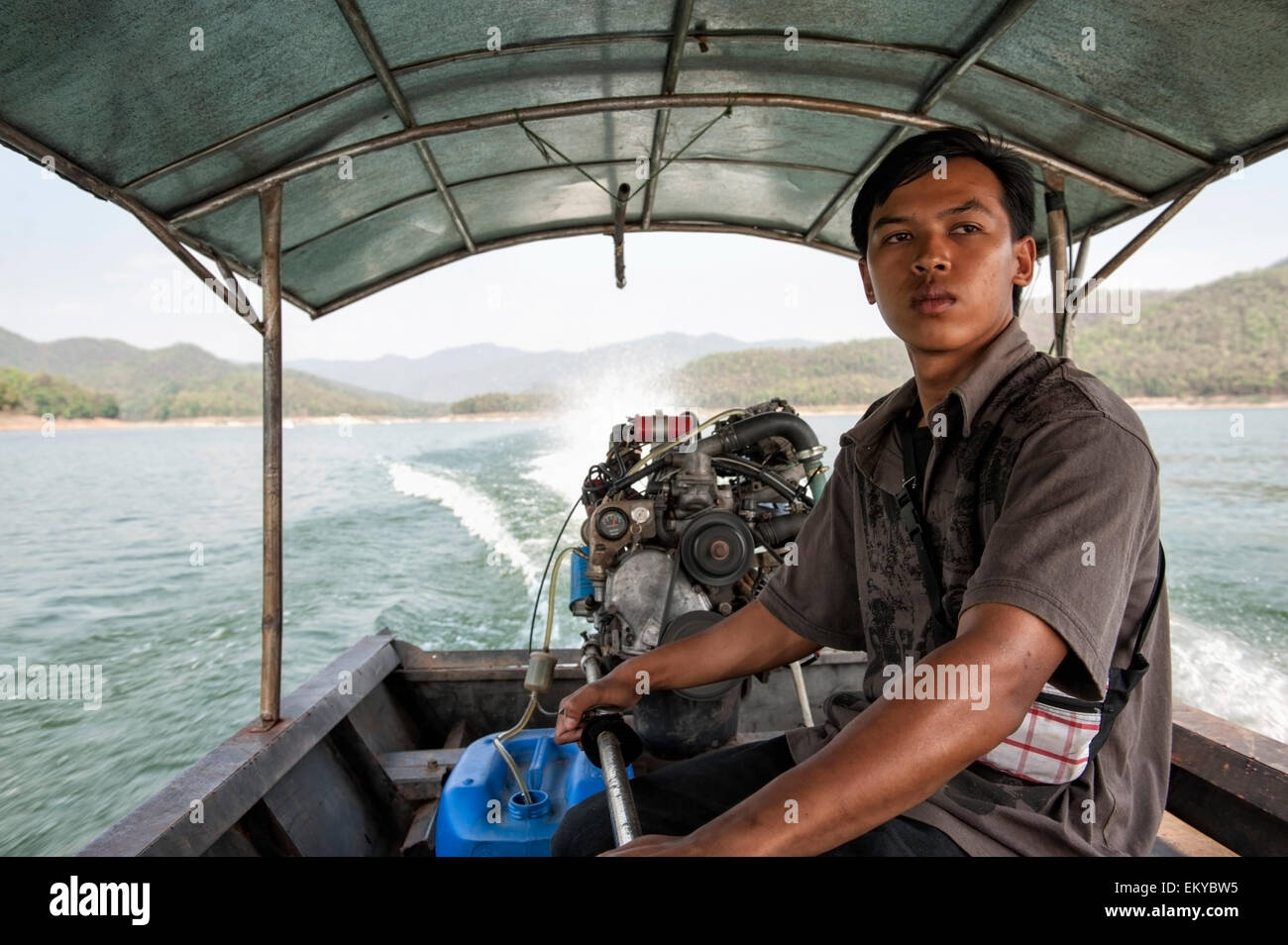 Thailand, Boat driver in Mae Ngat dam; Chiang Mai Stock Photo - Alamy