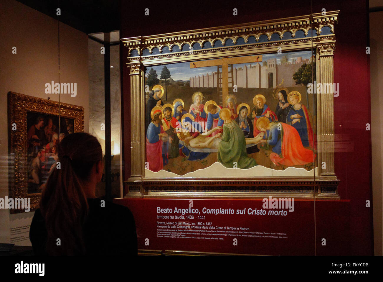 Turin, Italy. 14th Apr, 2015. A girl observes the painting "Compianto ...