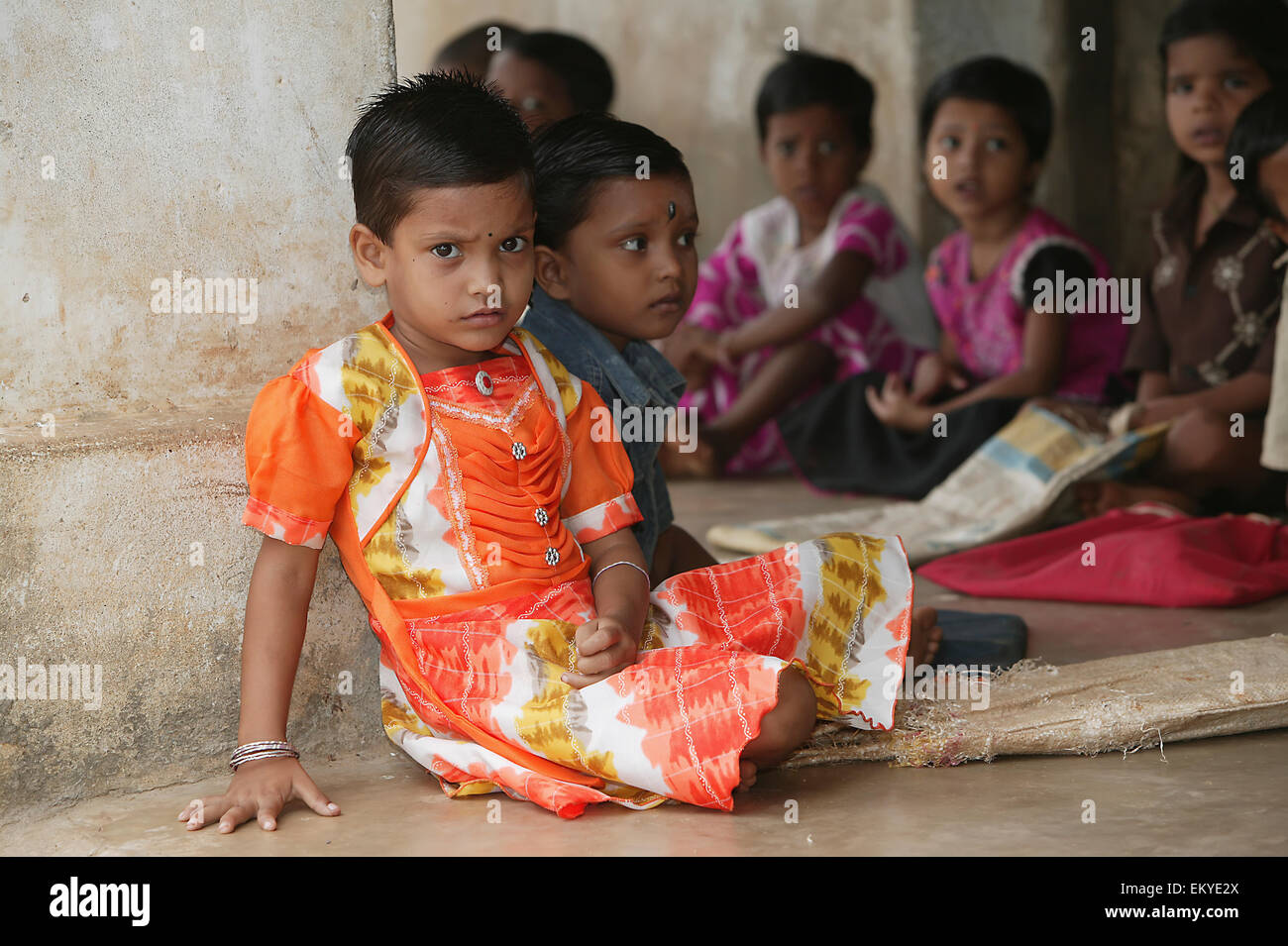 Preschool children sitting in a corridor; Badabhuin Village, Badamba ...