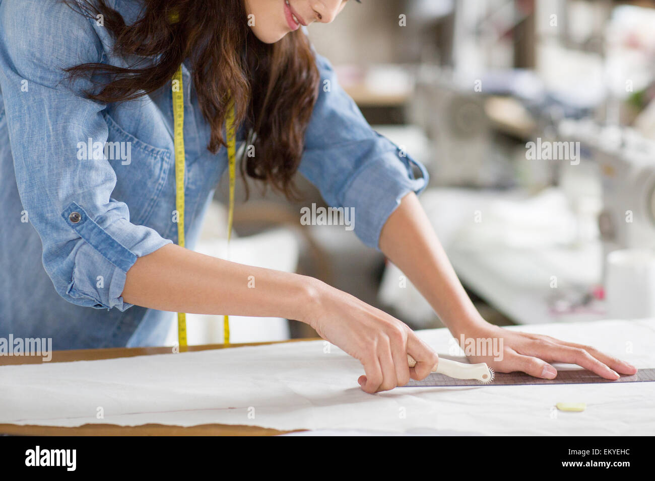 Fashion designer working in studio Stock Photo - Alamy