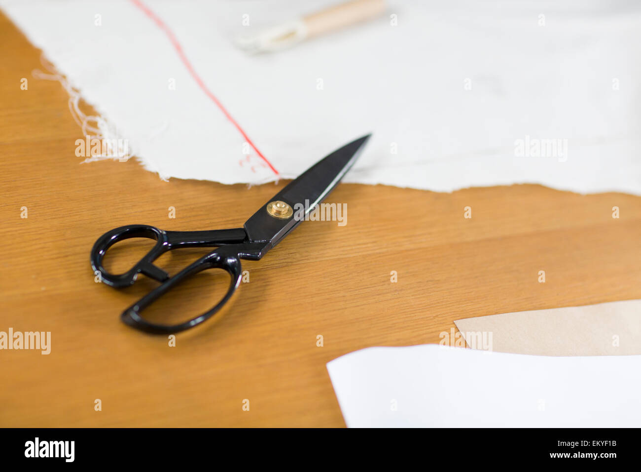 Scissors and fabric Stock Photo - Alamy