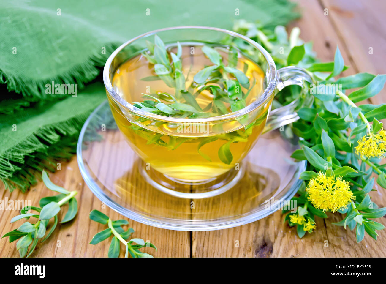 Herbal tea in cup with Rhodiola rosea and napkin on board Stock Photo ...
