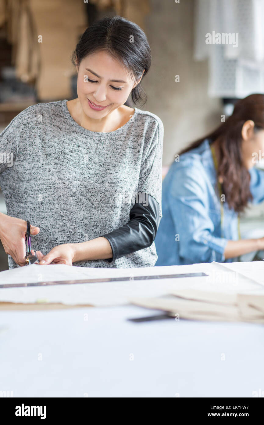 Fashion designers working in studio Stock Photo - Alamy