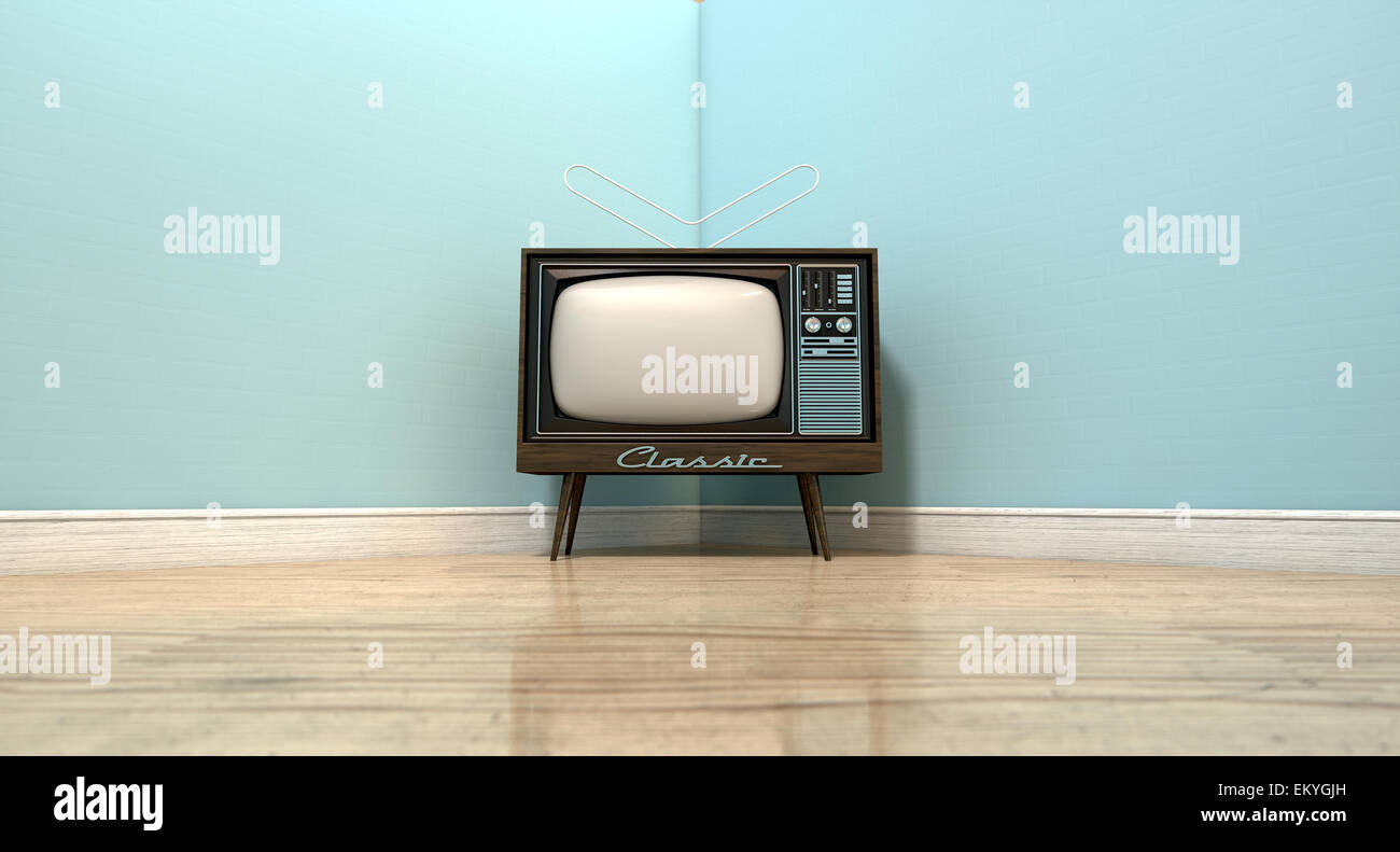 An old vintage television set in the corner of an empty room with light ...
