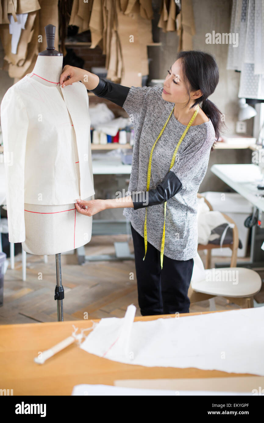 Fashion designer working in studio Stock Photo - Alamy