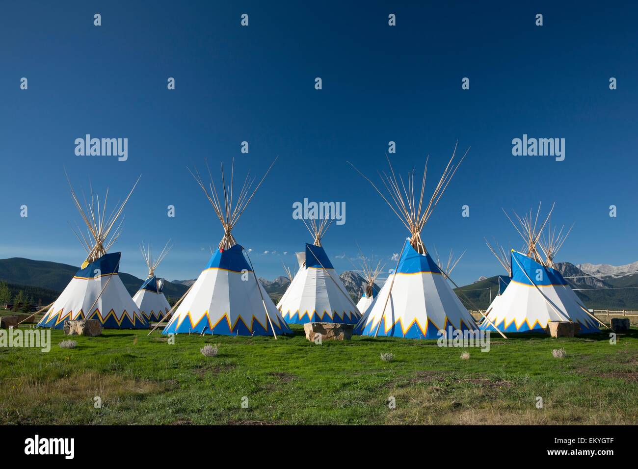 Teepees In The Mountains; Alberta, Canada Stock Photo - Alamy