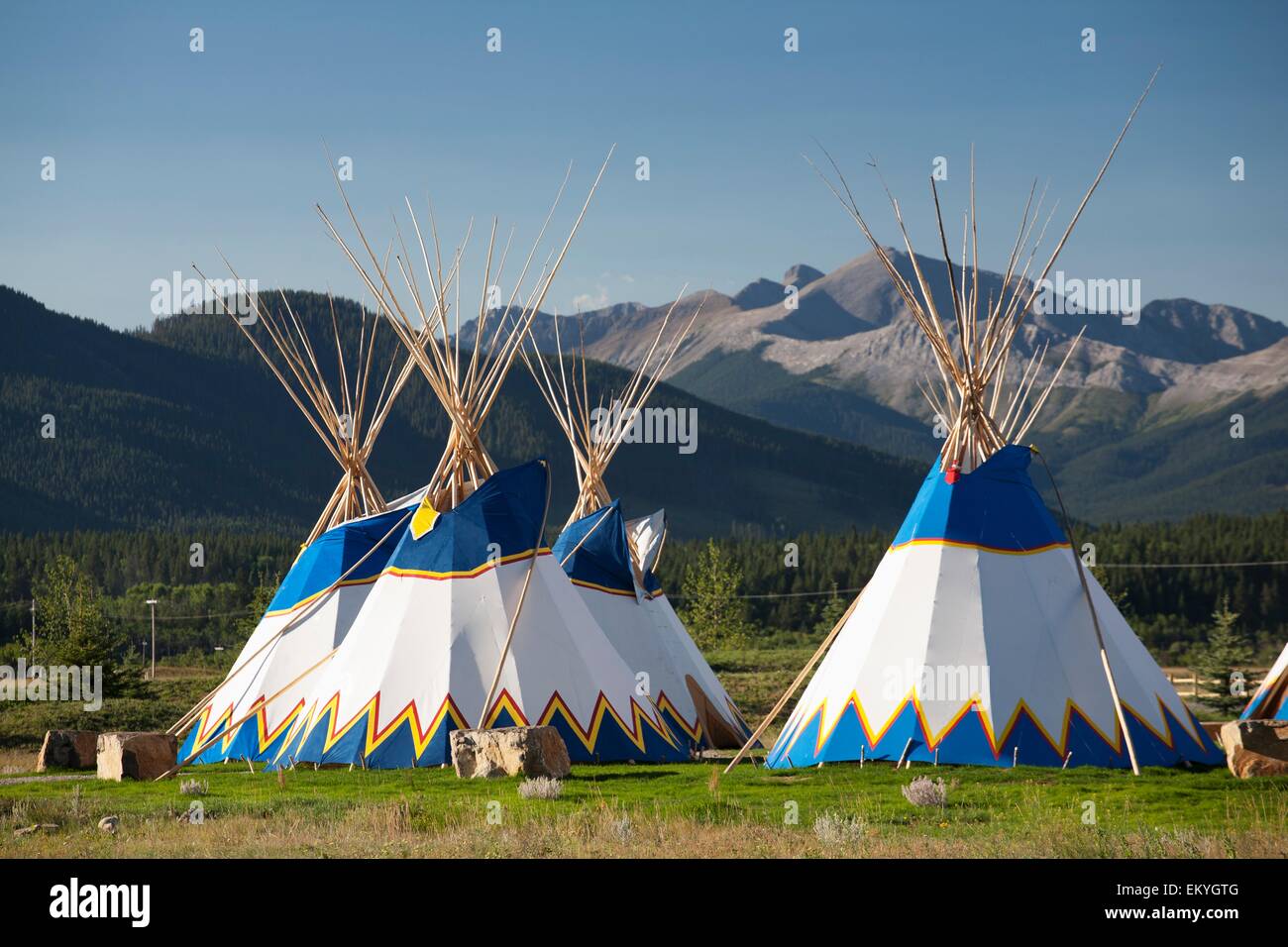 Teepees In The Mountains; Alberta, Canada Stock Photo - Alamy