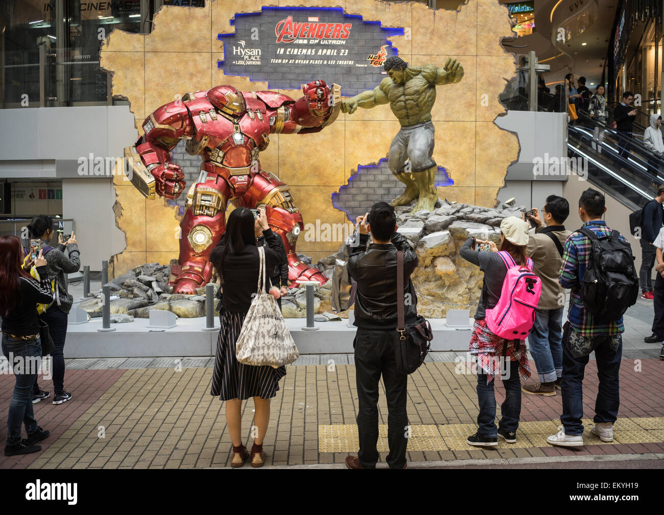 Avengers statues attract numbers of people photographing the display ...