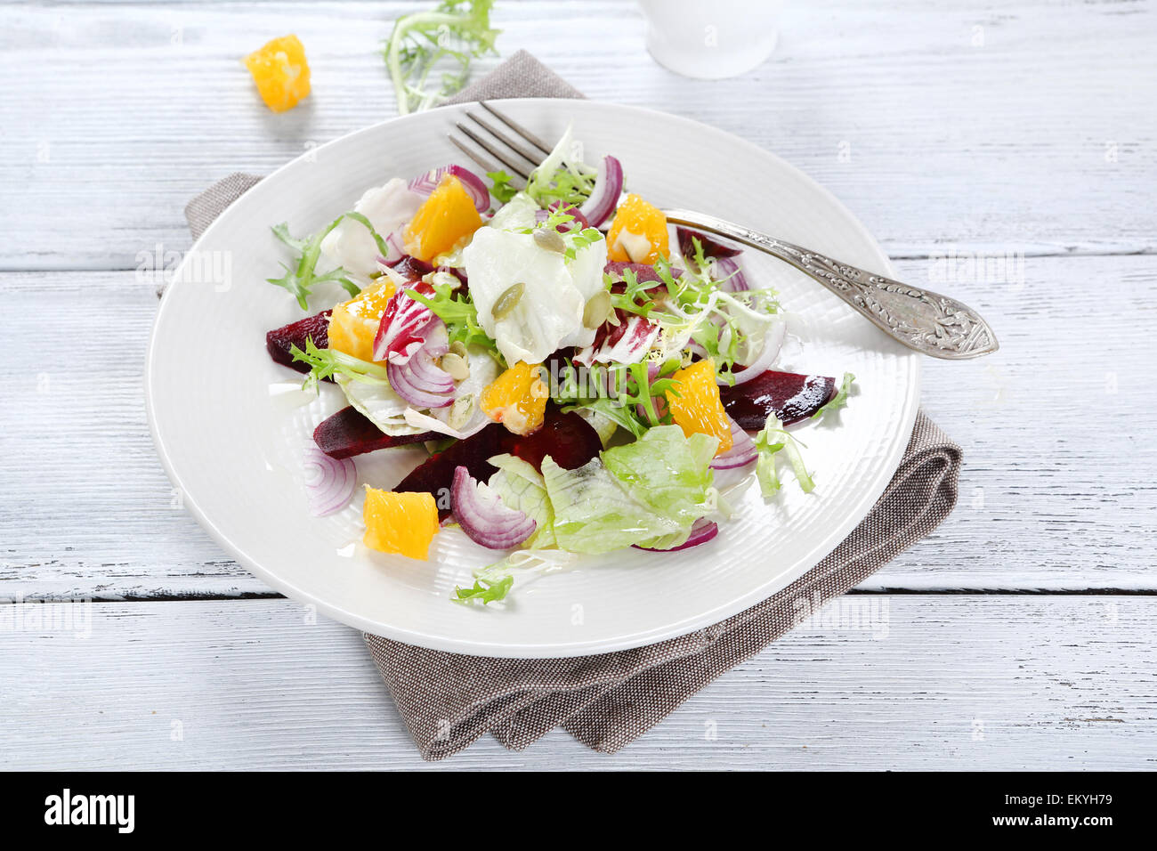 Salad with sauce on a plate, food Stock Photo - Alamy