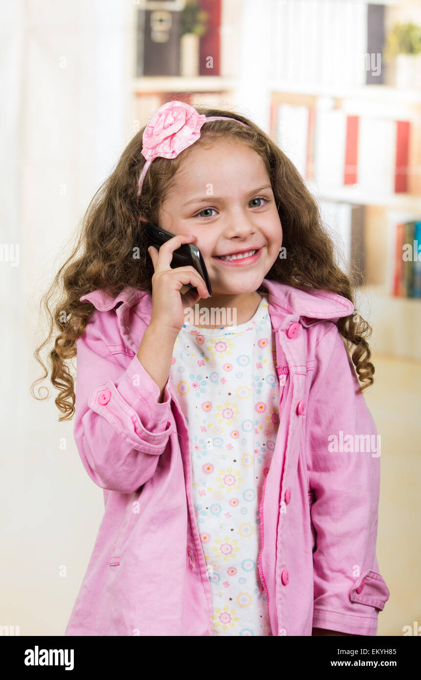 cute little girl using cell phone Stock Photo - Alamy