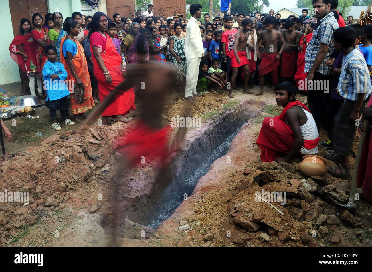 Agartala, India's northeastern state Tripura. 14th Apr, 2015. Hindu devotees run over ...